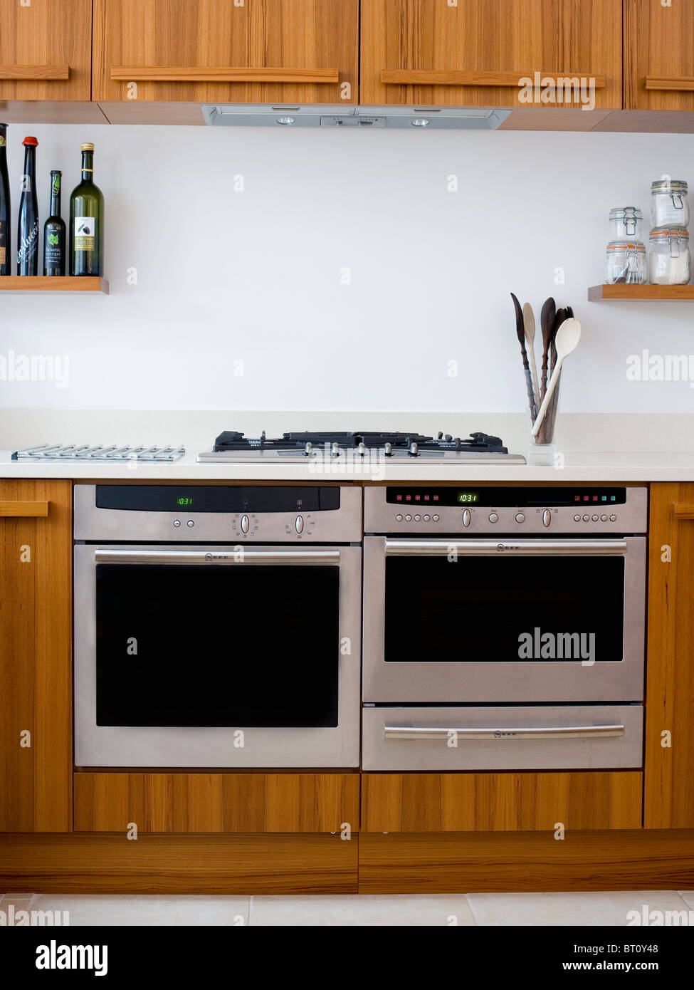 Double stainless-steel ovens in modern kitchen Stock Photo - Alamy