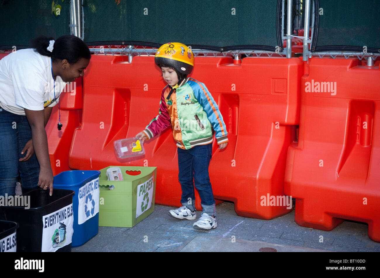 A child learns about recycling at the recycling olympics at the 22nd ...