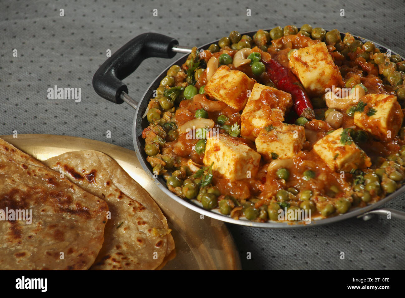 Mattar Paneer is a popular main course Indian dish made with green peas ...