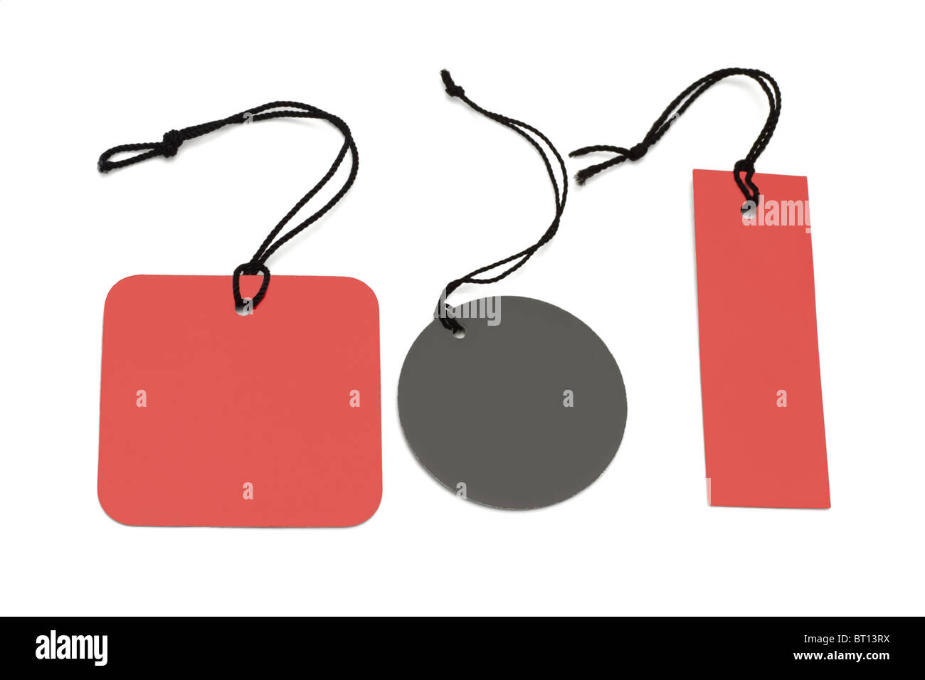 Assorted shape price labels with black strings on white background ...