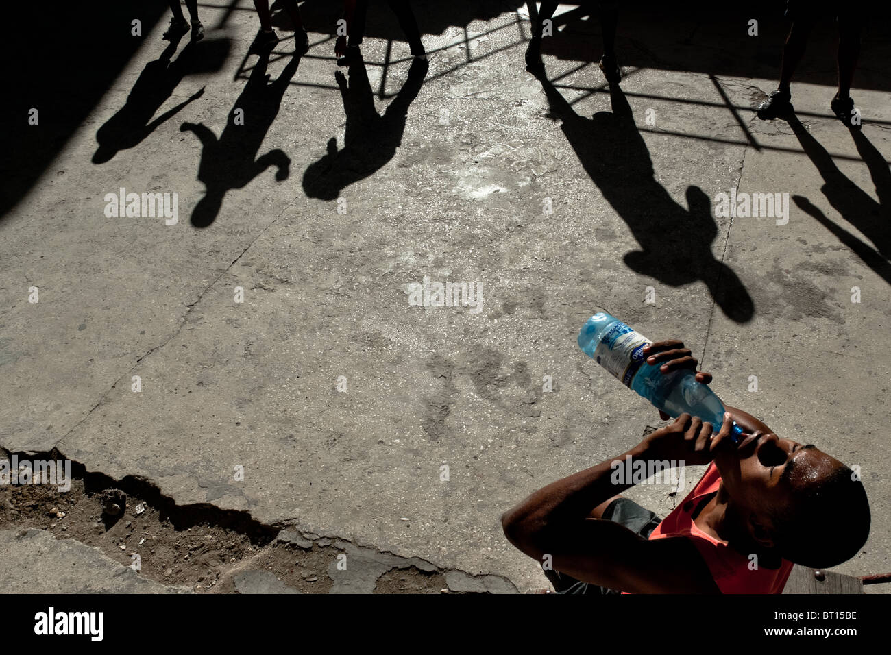 A Cuban boy drink water during a training session at Rafael Trejo ...