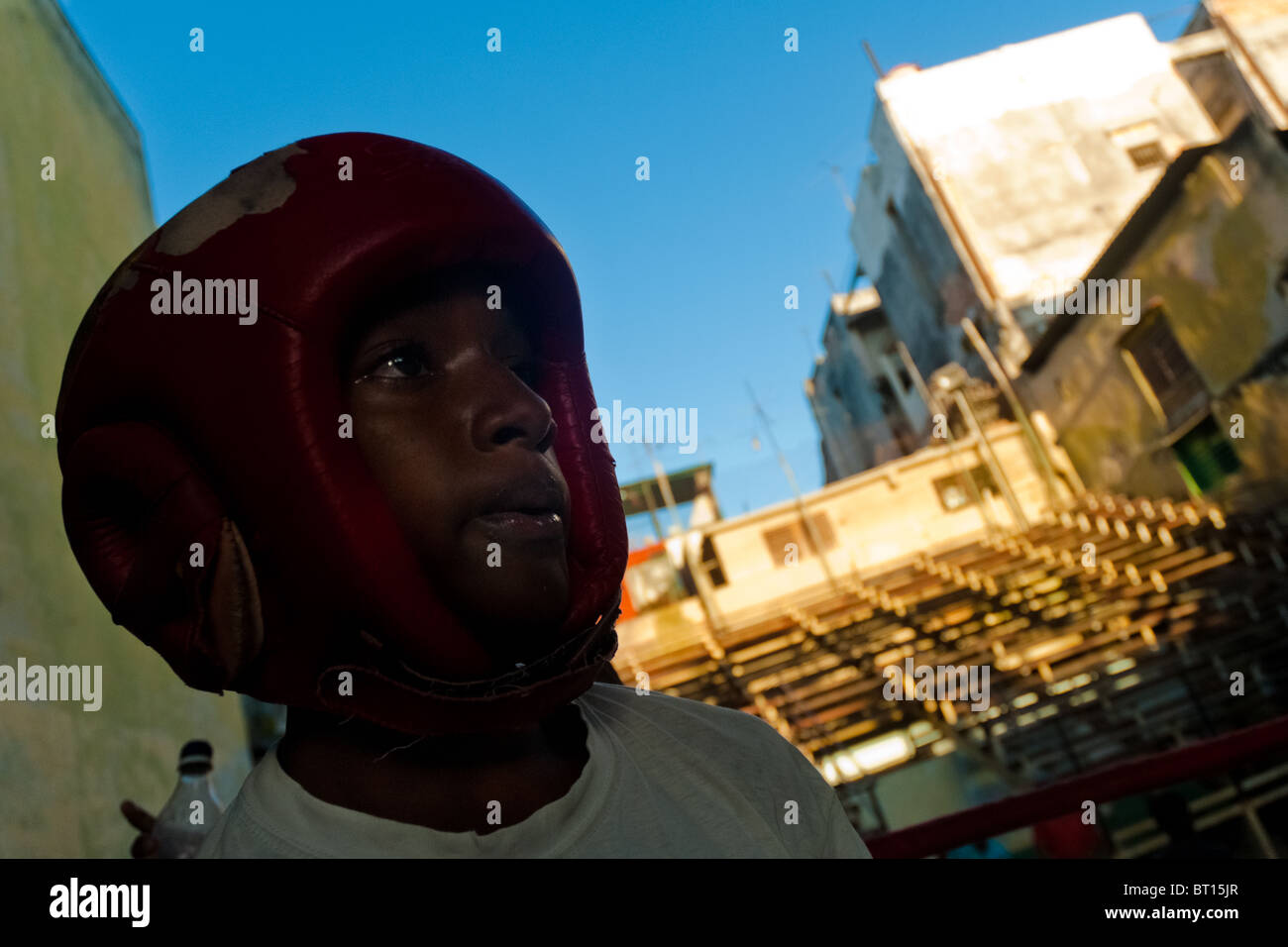 A young Cuban fighter wearing a headgear during a training session at ...