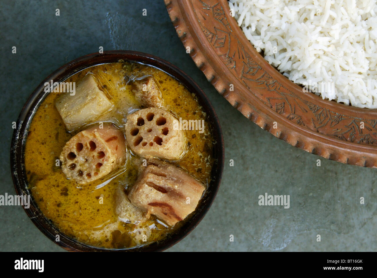 Lotus curry is an Indian dish made of lotus stem cooked in tomato onion ...