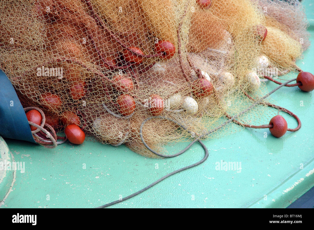 fishing net on a boat Stock Photo - Alamy