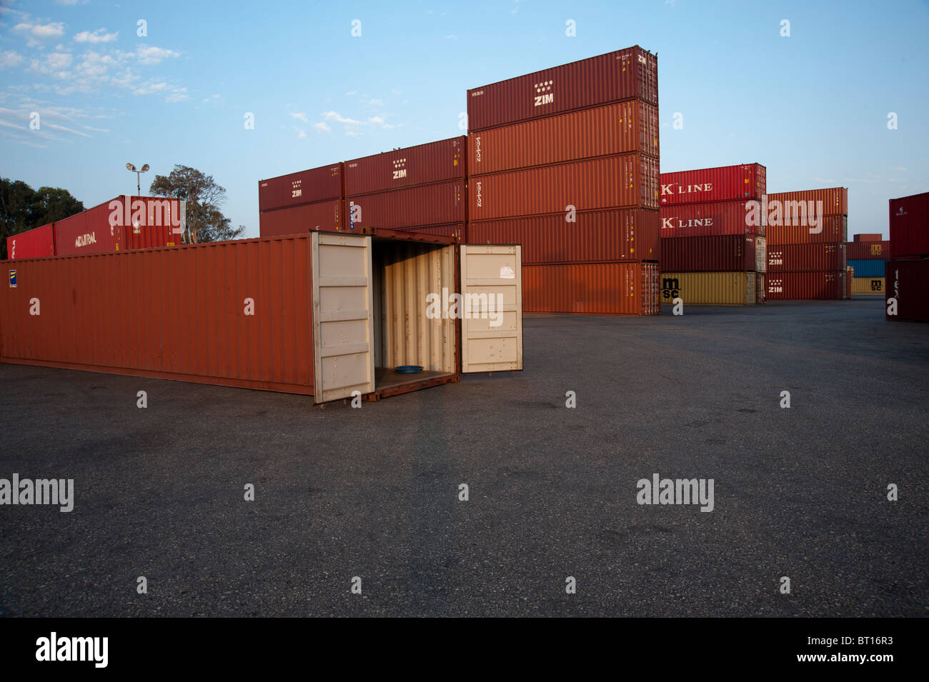 Shipping containers at a port awaiting export Stock Photo - Alamy