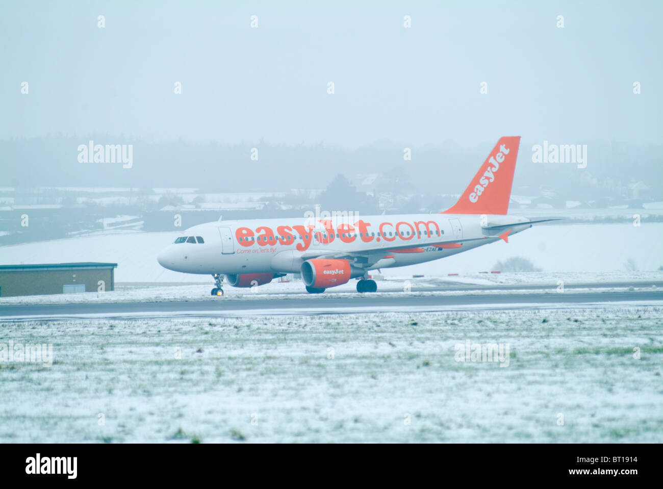 A snow covered Luton airport UK Stock Photo - Alamy