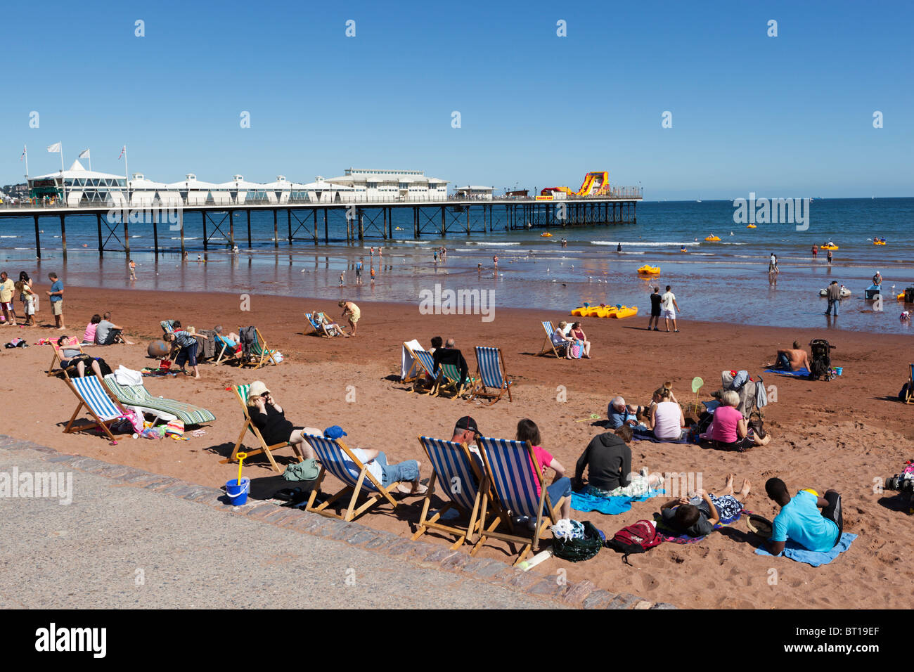 Paignton beach and pier in Summer Stock Photo - Alamy