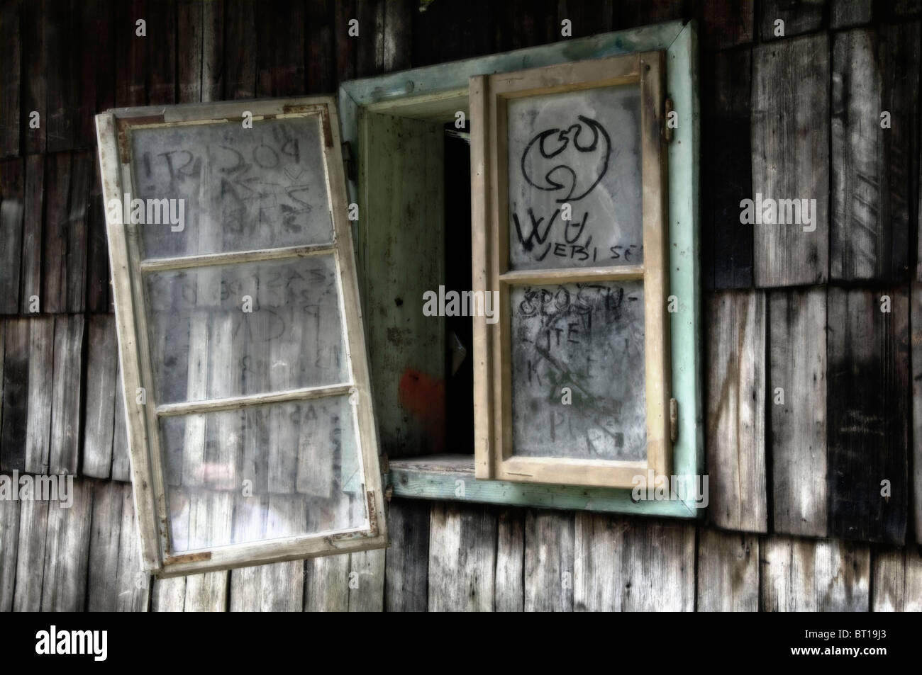 Graffiti on Window on Mountain Hut in Slovenia Stock Photo - Alamy