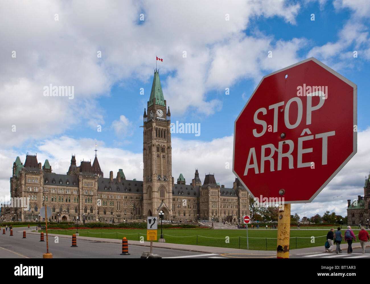 A French-English bilingual stop (arret) sign is see by the Canadian ...