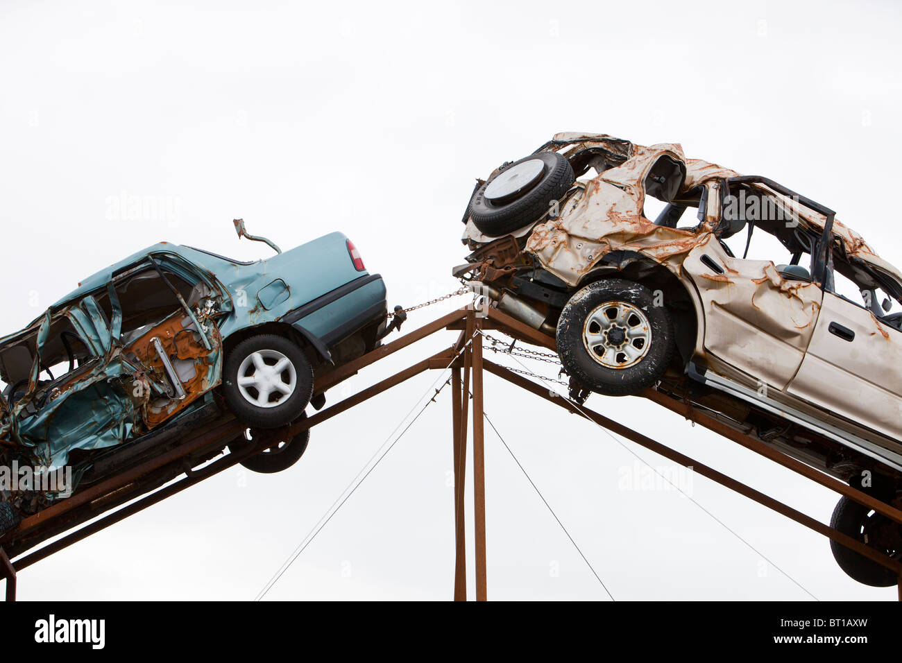 Wrecked cars displayed by the roadside on the outskirts of Reykjavik to ...