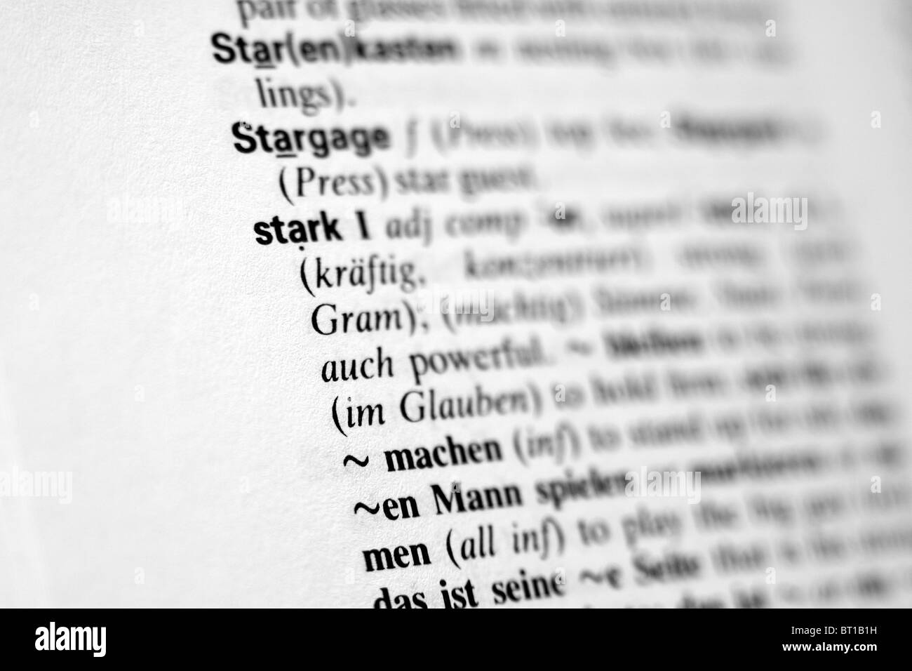 A German dictionary entry called strong means stark Stock Photo - Alamy
