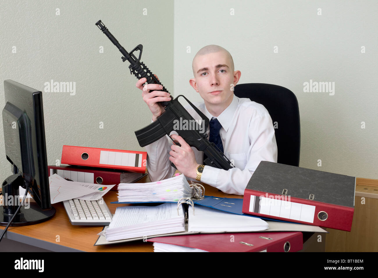 The chief accountant armed with a rifle Stock Photo - Alamy