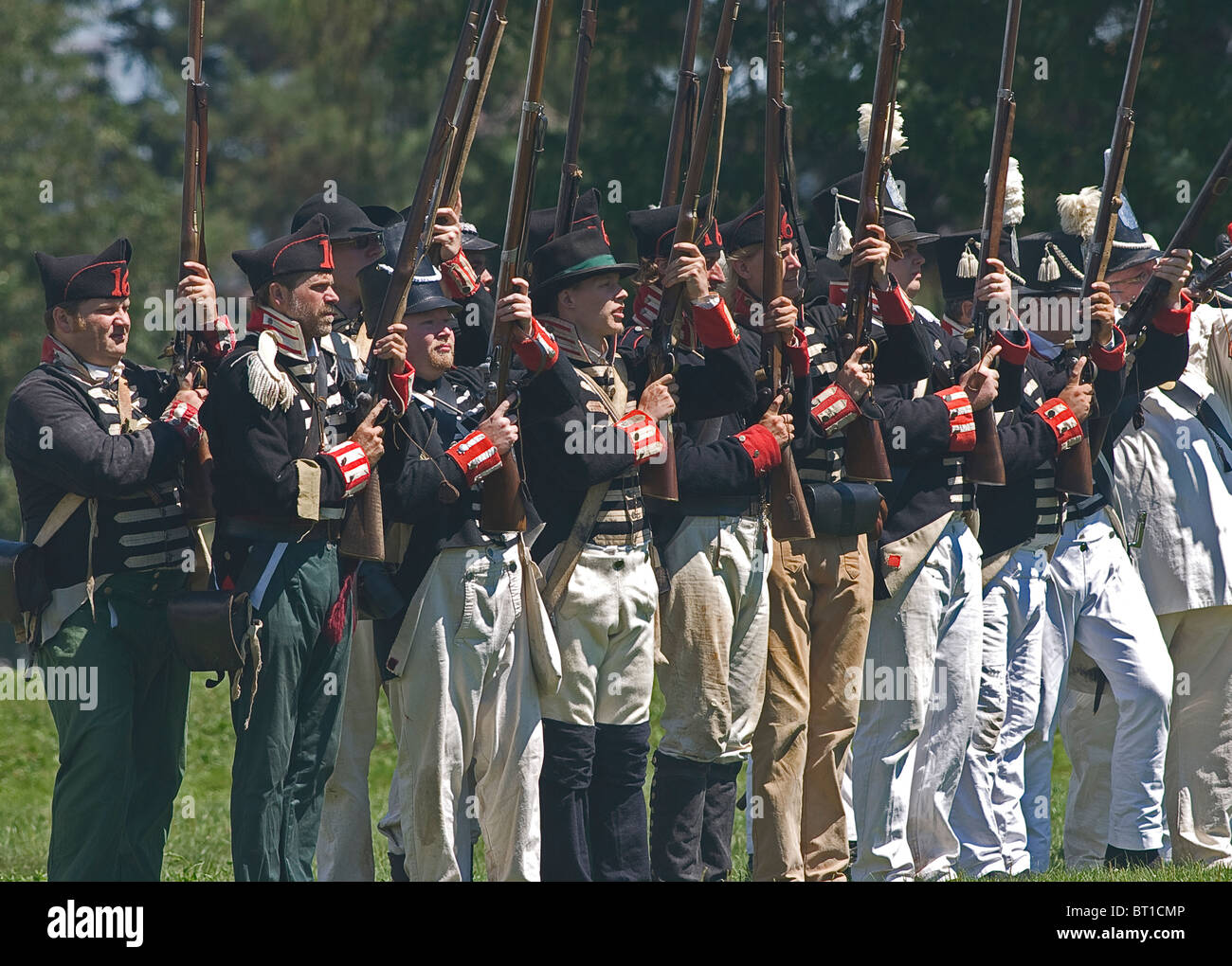 American Soldiers form a firing line to fire on the approaching British ...