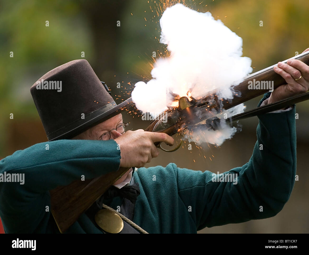 A reenactor fires his musket Saturday Oct. 2/2010 at Jordan Historical ...