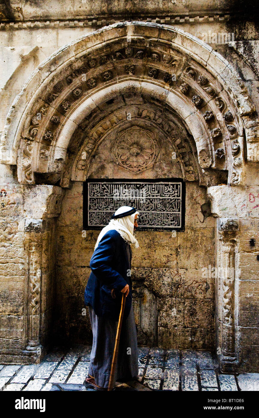 An old Palestinian man walking to the Al Aqsa mosque for the Friday ...