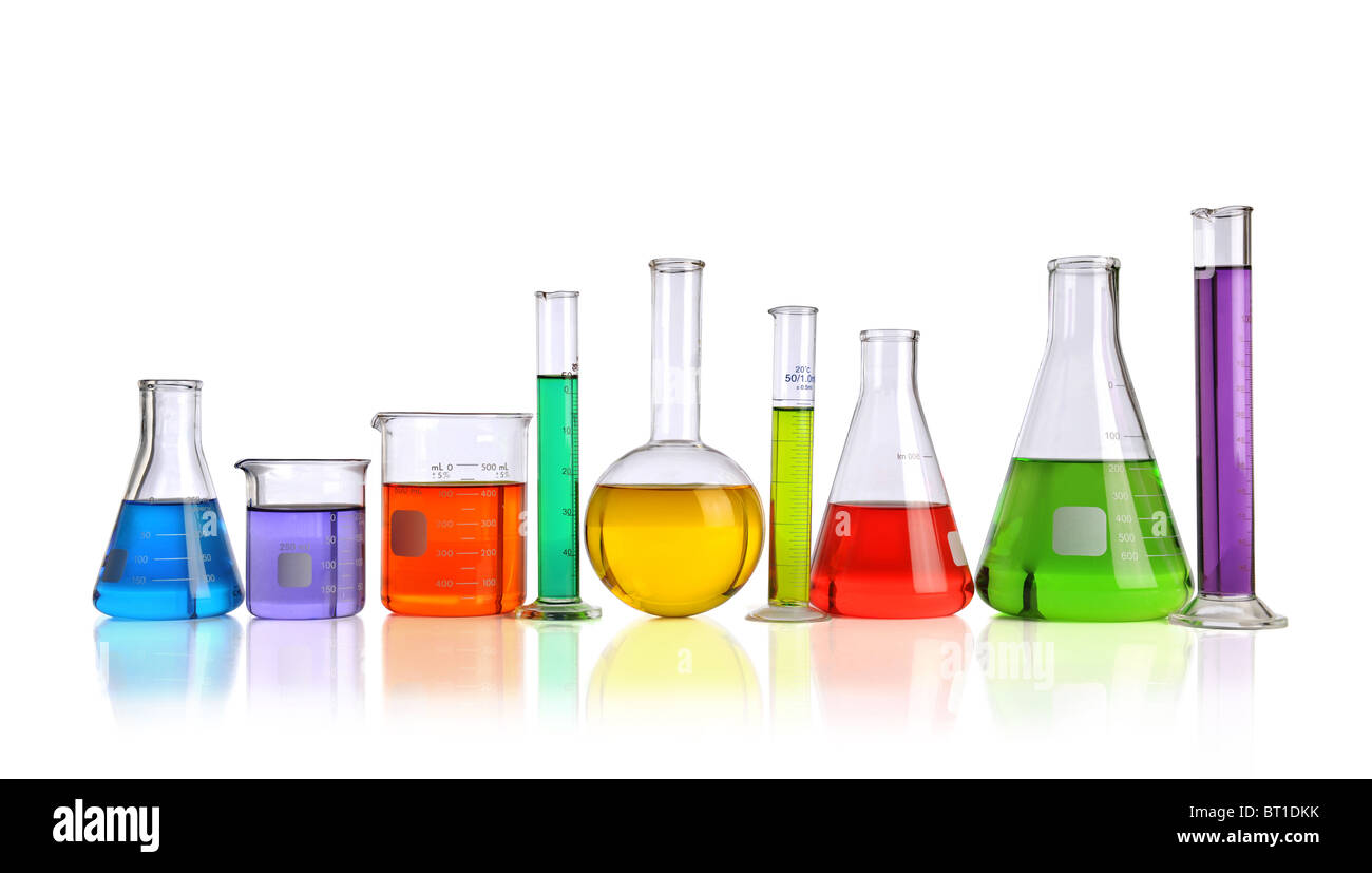 Laboratory glassware with liquids of different colors with reflections ...
