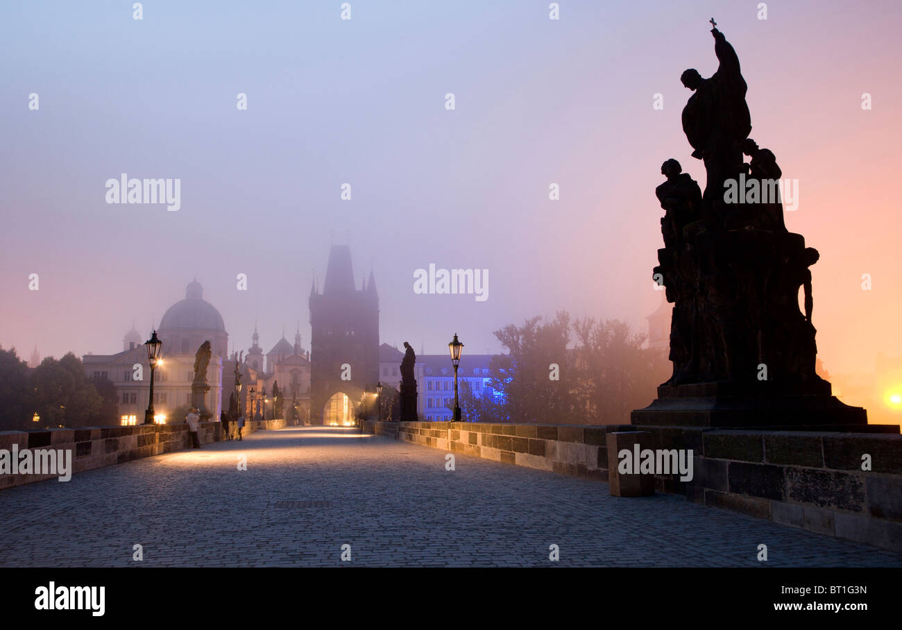 Prague - Charles bridge in the morning fog Stock Photo - Alamy