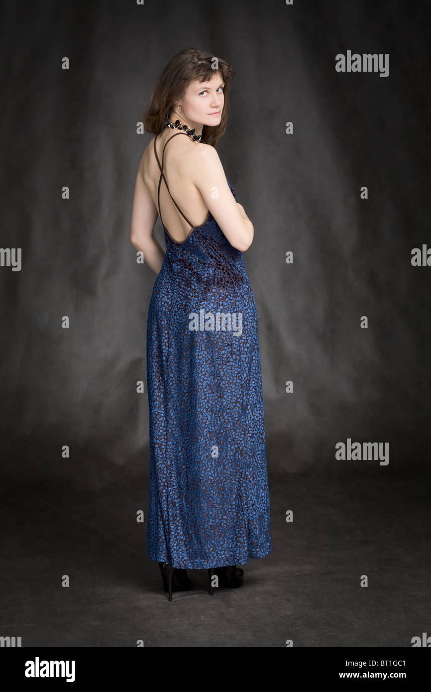 Girl in dark blue dress hi-res stock photography and images - Alamy