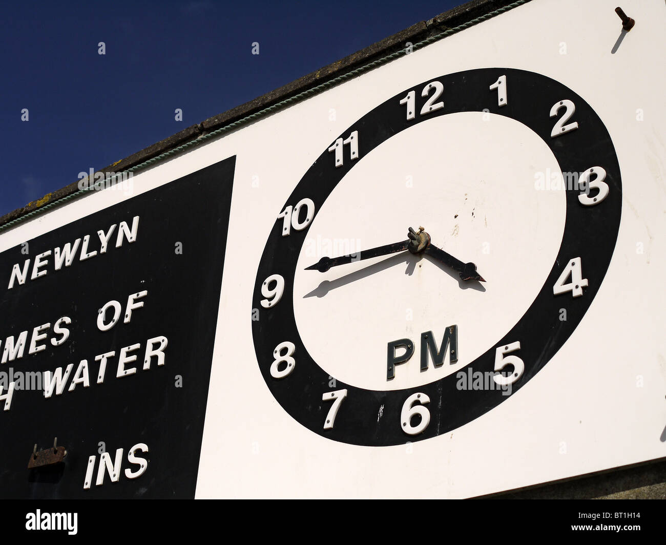 Tide clock Newlyn Cornwall UK Stock Photo - Alamy