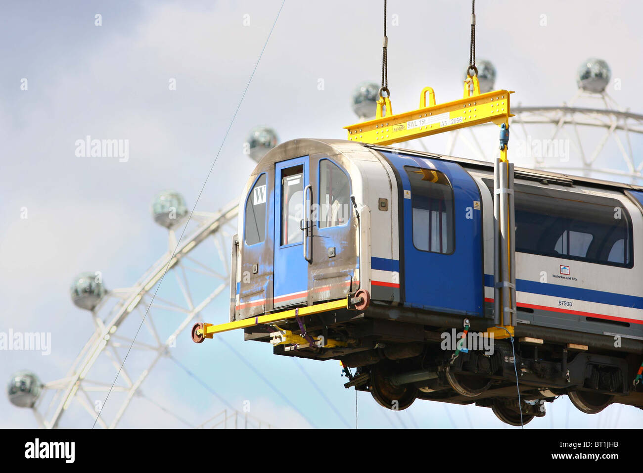 A tube train carriage is lifted out of the Waterloo and City tube line ...