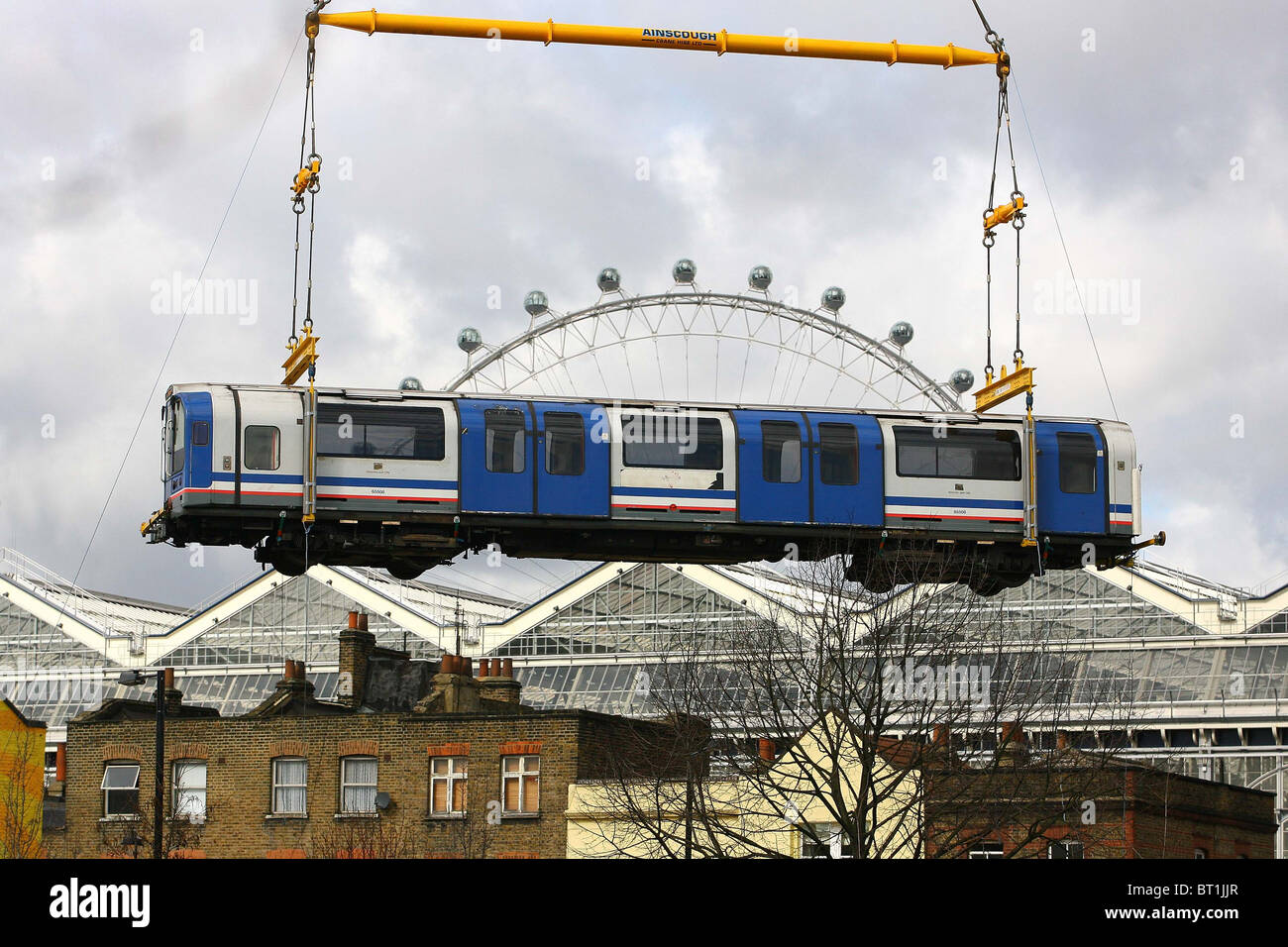 A tube train carriage is lifted out of the Waterloo and City tube line ...