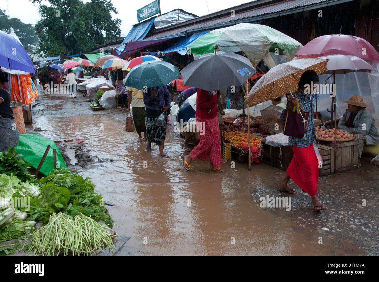 local daily market on a wet monsoon day. Augban. Shan State. Myanmar ...