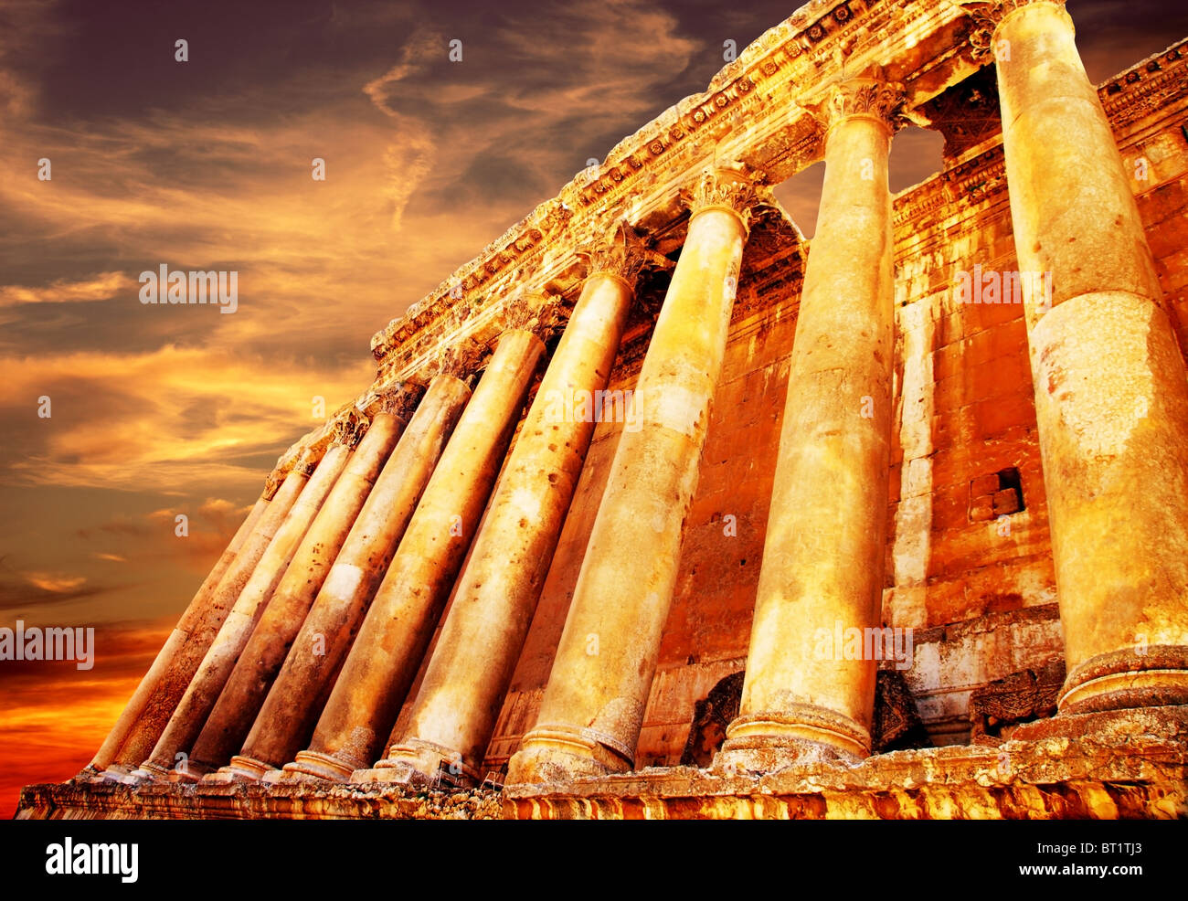 Jupiter's temple ancient Roman columns over sunset, Baalbek, Lebanon ...