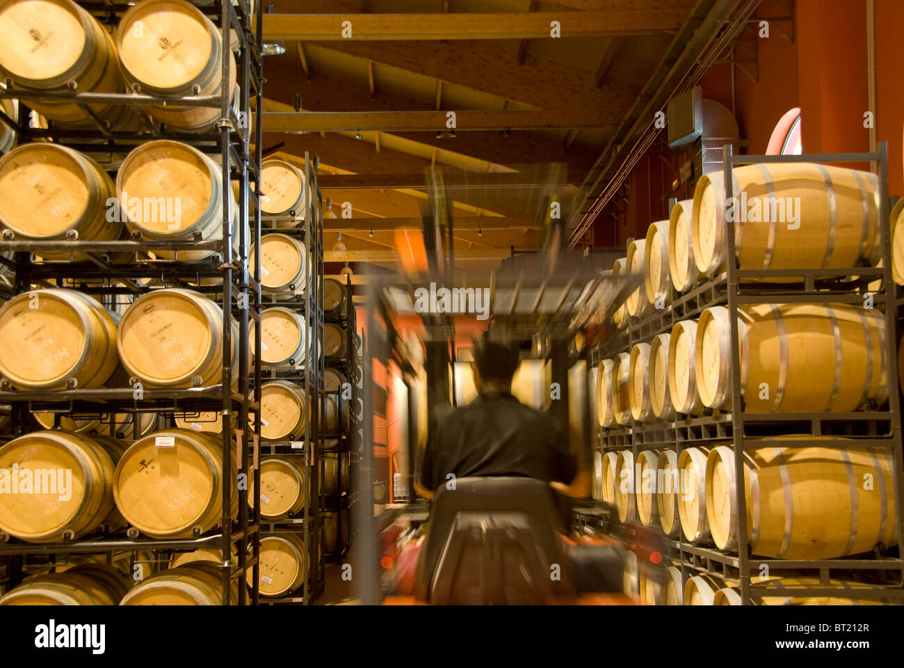 Fork Lift drives through a wine depot Stock Photo - Alamy