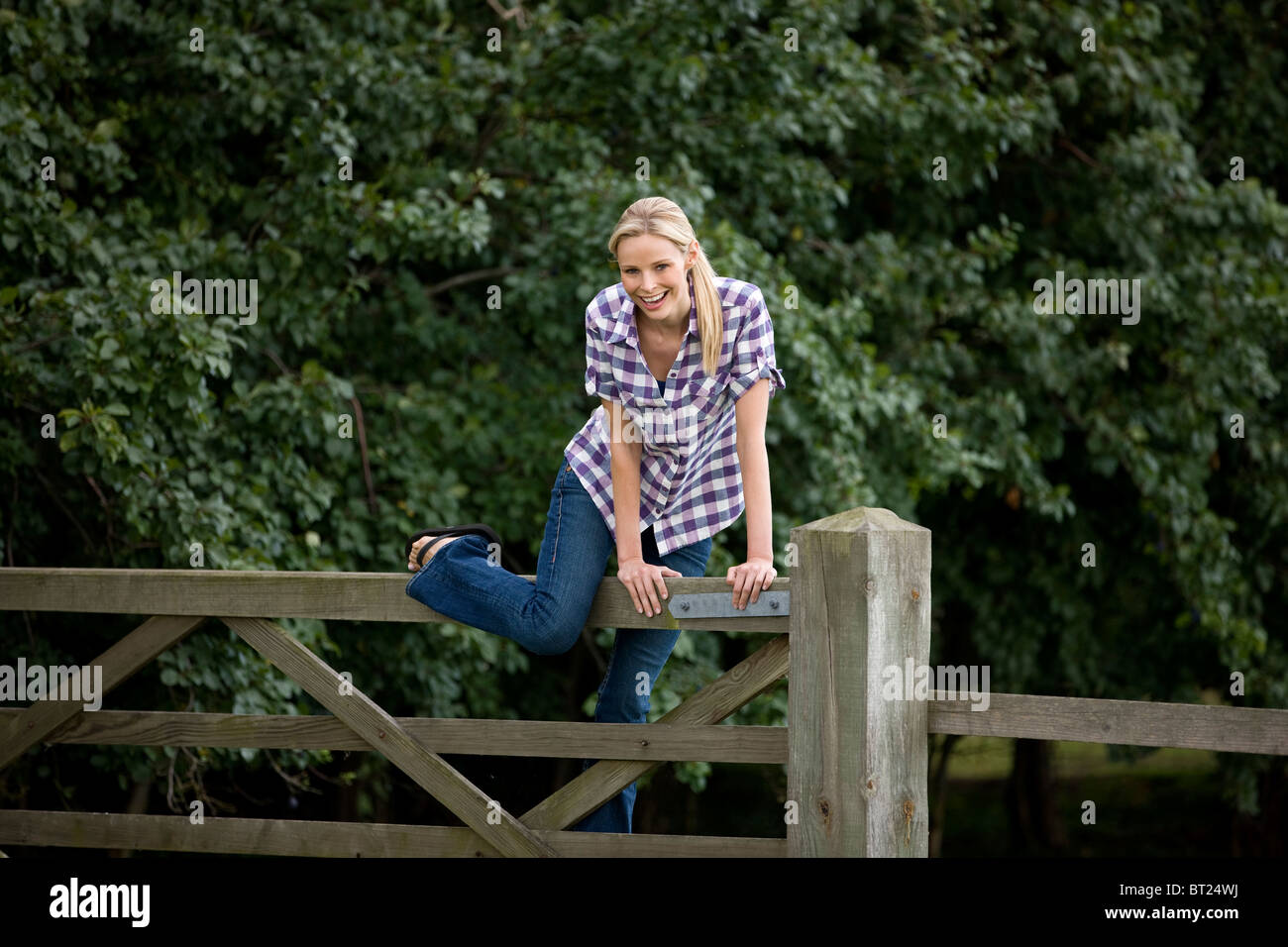 Climbing over a gate hi-res stock photography and images - Alamy