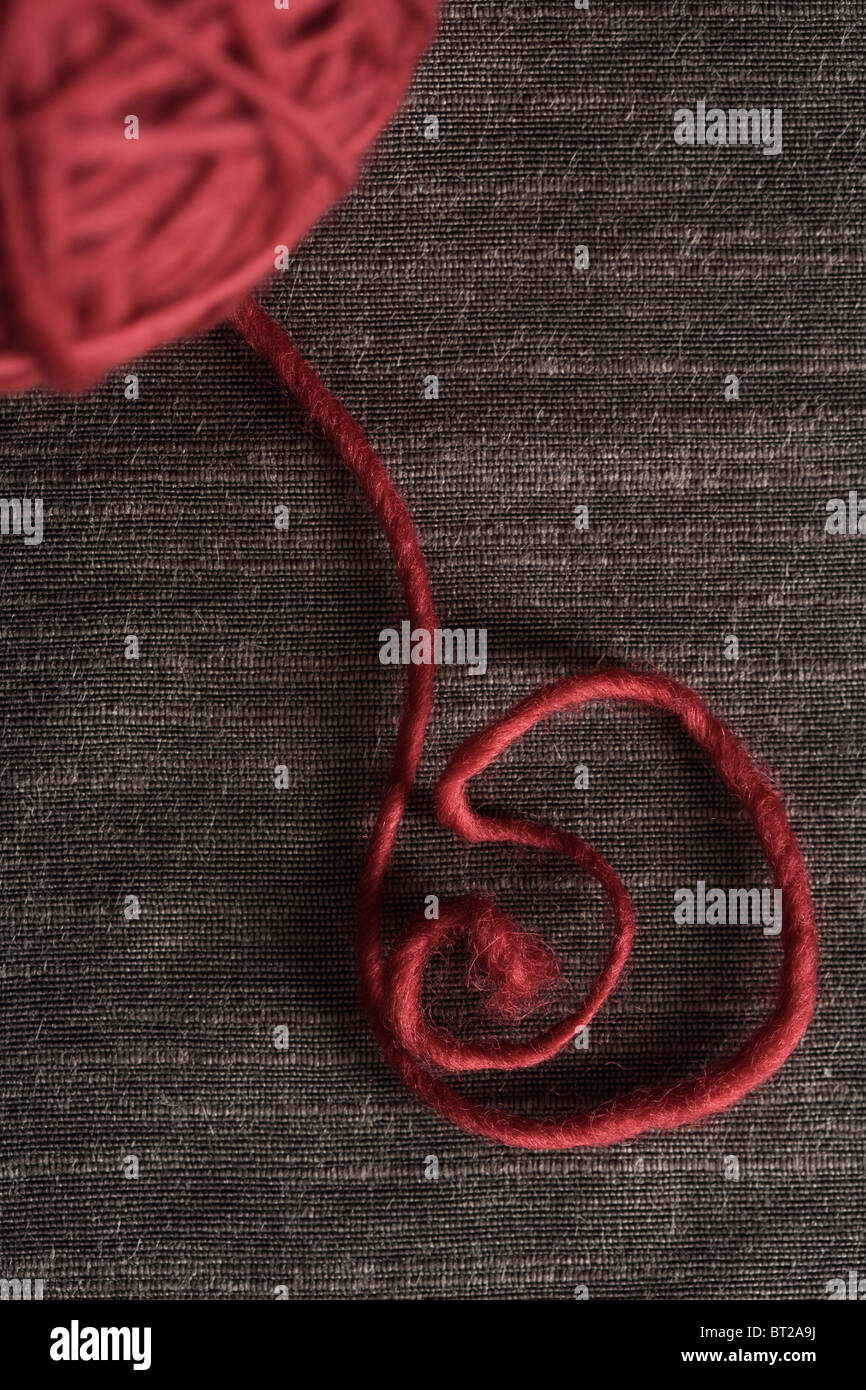 Red ball wool yarn hi-res stock photography and images - Alamy