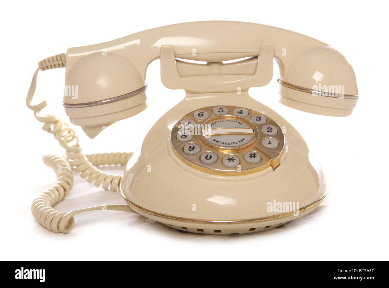 Cream retro telephone studio cutout Stock Photo - Alamy