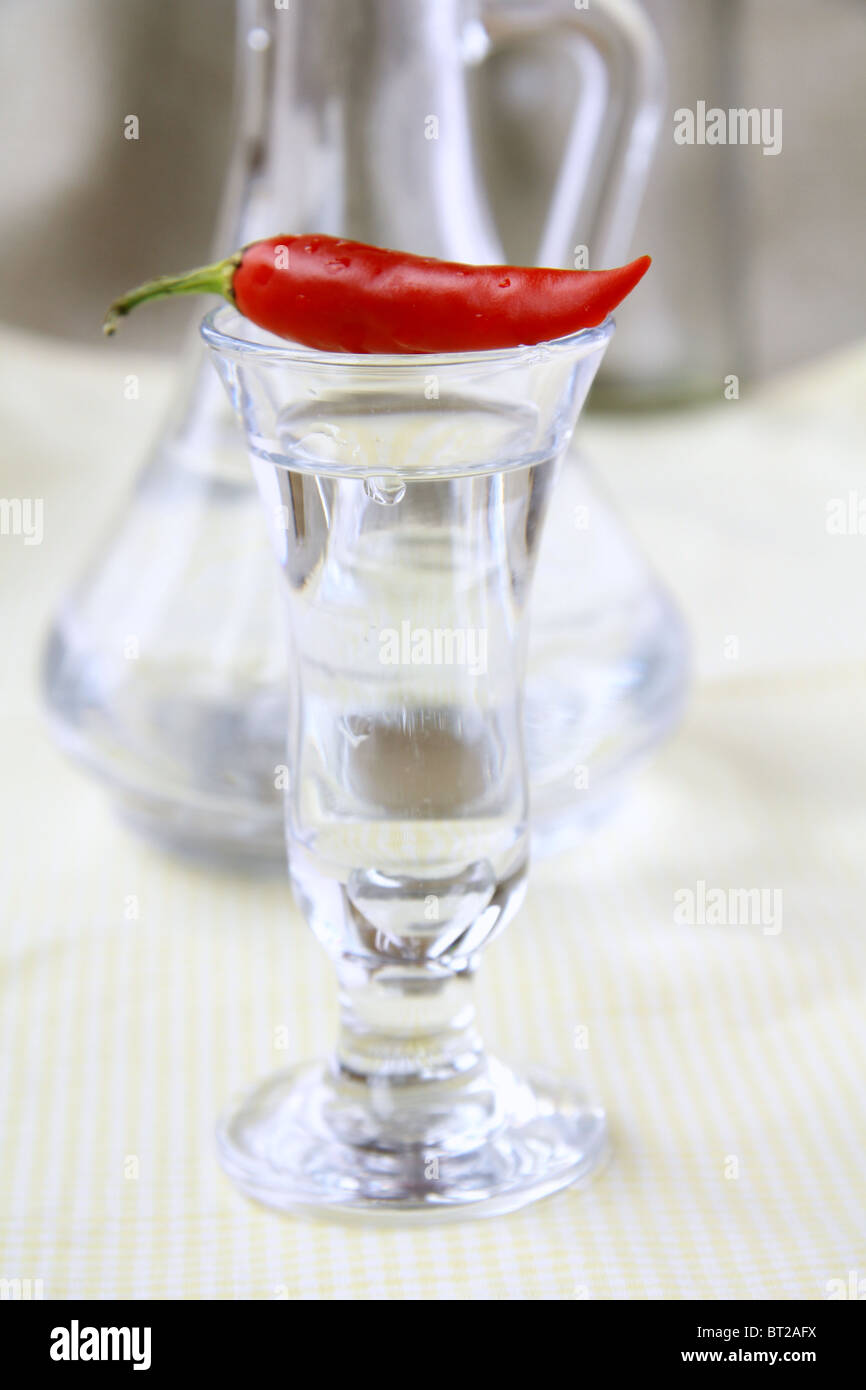 Russian vodka with red chili and a bottle Stock Photo - Alamy