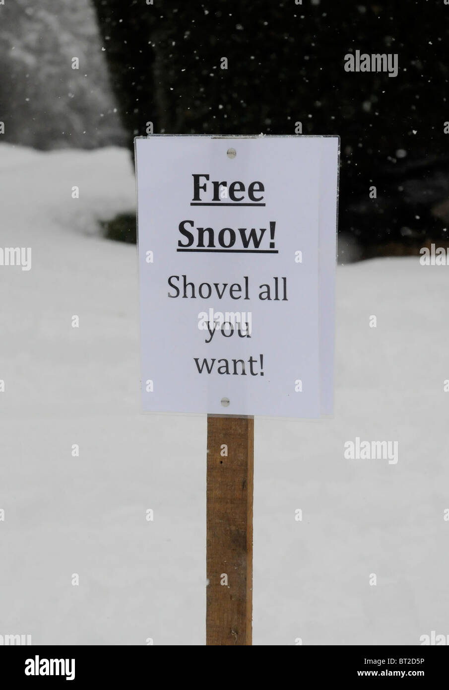 Silly sign in snow Stock Photo - Alamy
