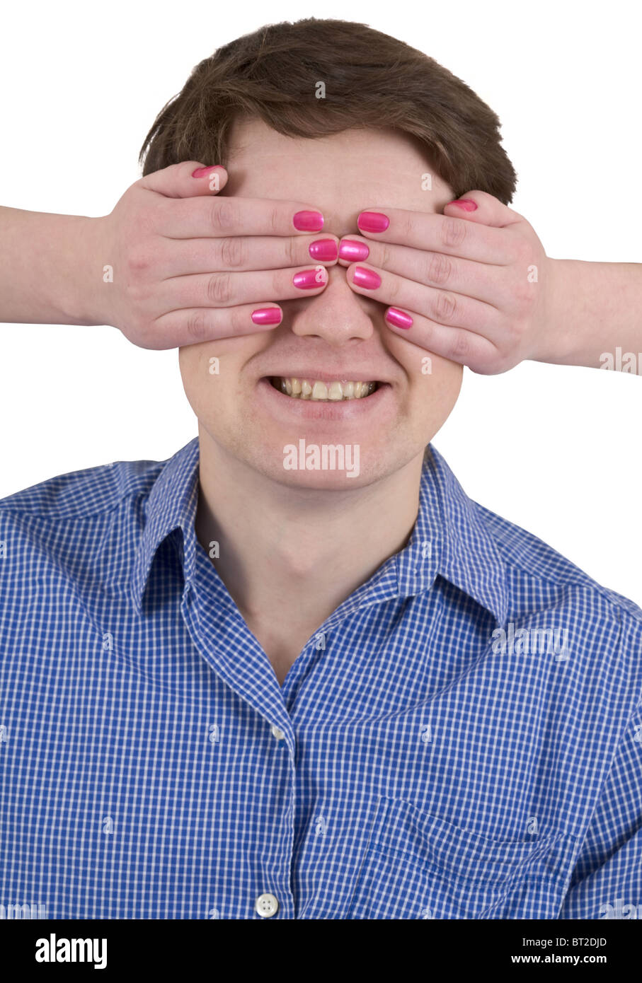 Man with covered eyes female hands on white Stock Photo - Alamy