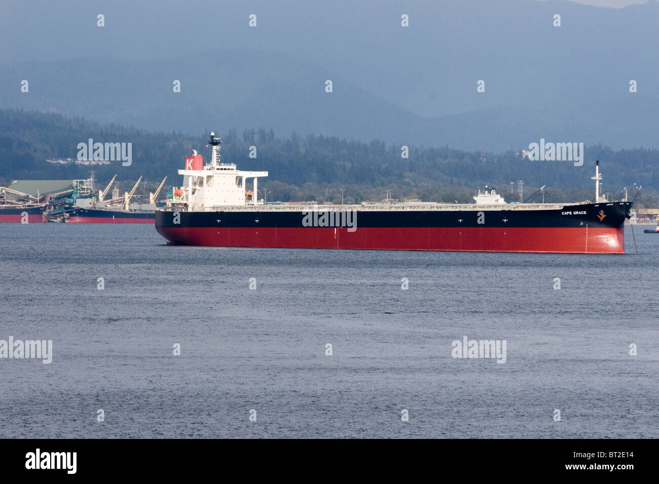 Cargo Ship in port in Vancouver BC Canada Stock Photo - Alamy