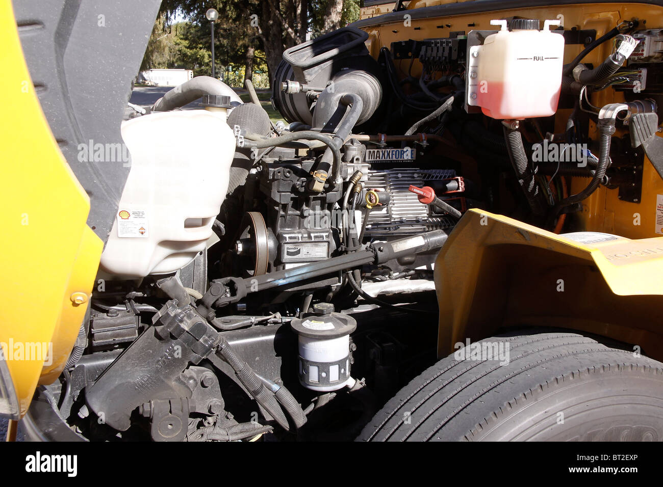 Stock image of a hybrid school bus motor on display promoting ...
