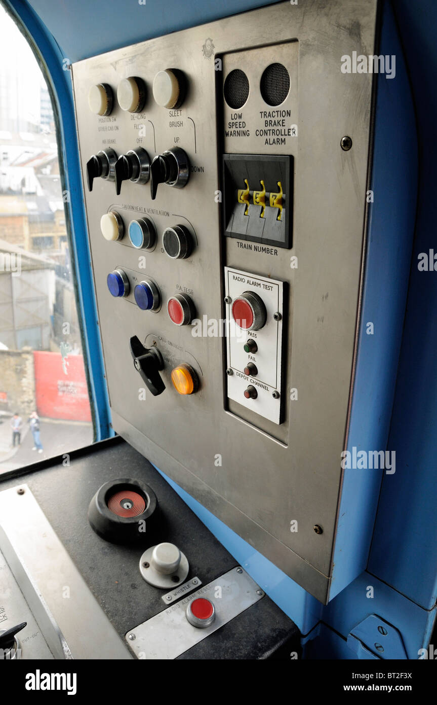 Control panel inside drivers cab of tube train Stock Photo - Alamy