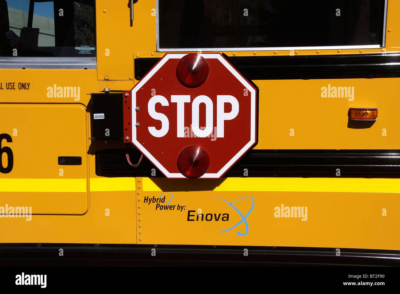 Stock image of a hybrid school bus on display promoting alternative ...