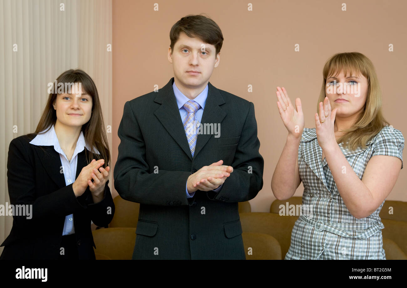 People applaud acting in a conference hall Stock Photo - Alamy