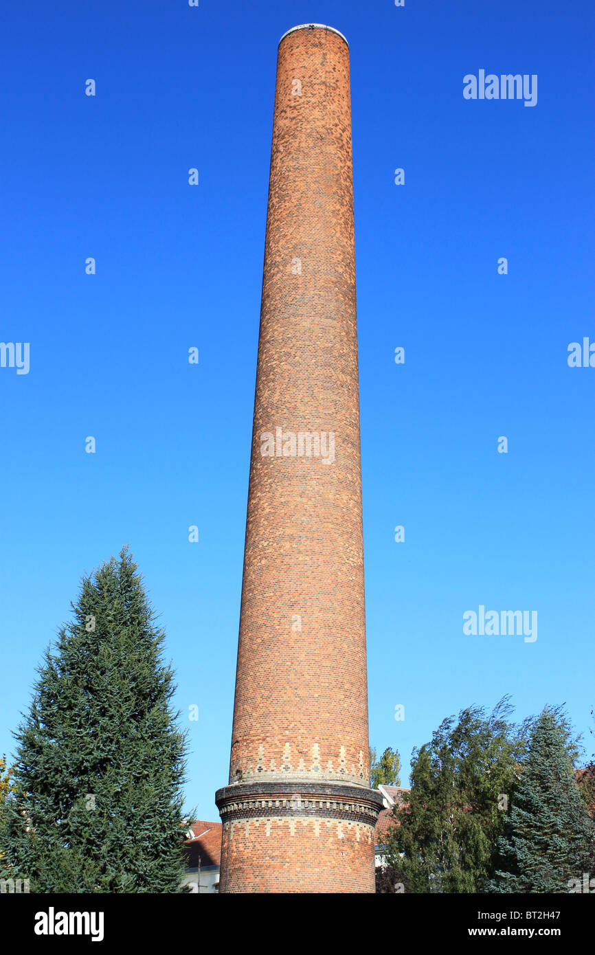 A large factory chimney built out of bricks Stock Photo - Alamy