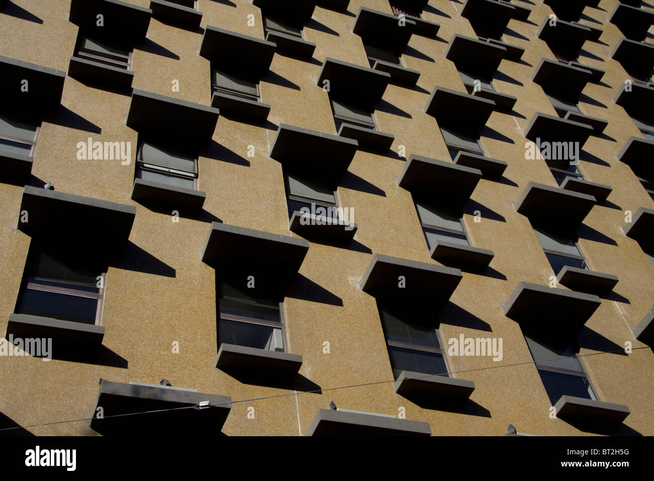Uniform rows of windows of commercial building in Melbourne Australia ...
