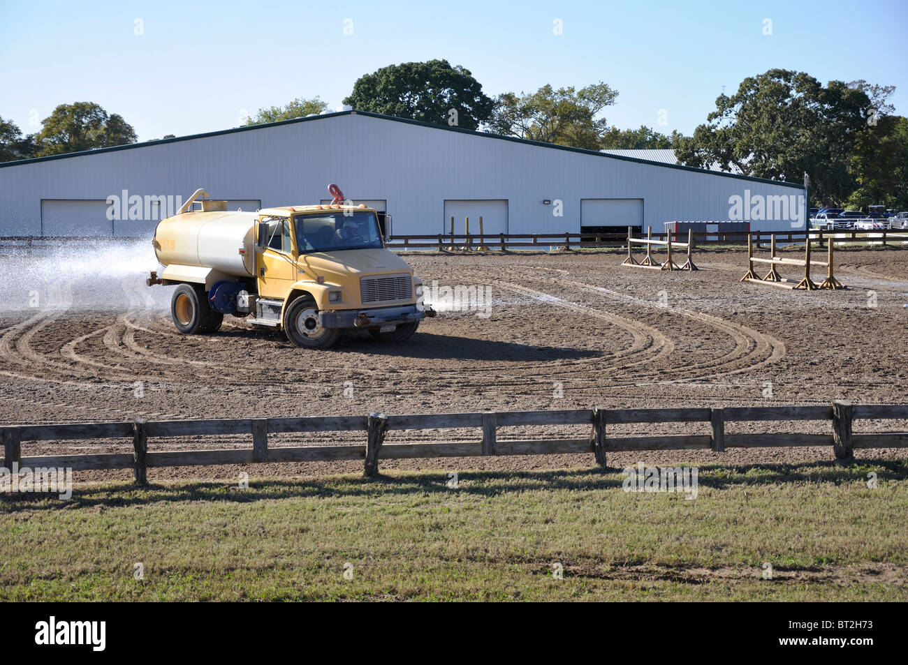 Equestrian field maintenance Stock Photo - Alamy