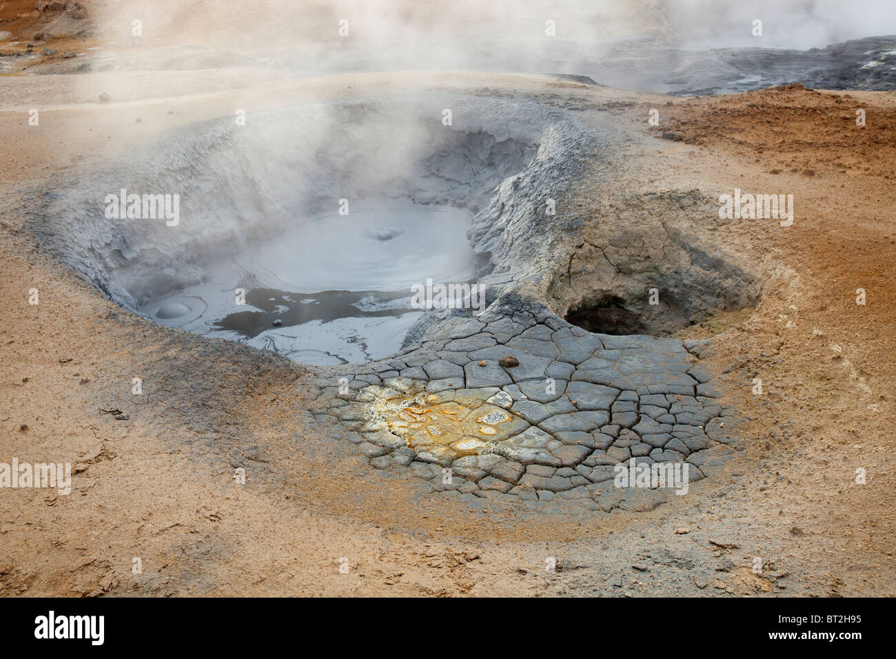 Bubbling mud pools in the geothermal area of Hverir near Myvatn ...