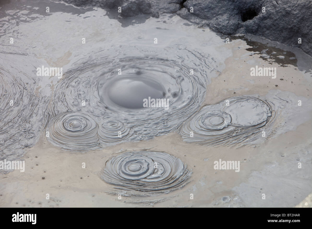 Bubbling mud pools in the geothermal area of Hverir near Myvatn ...