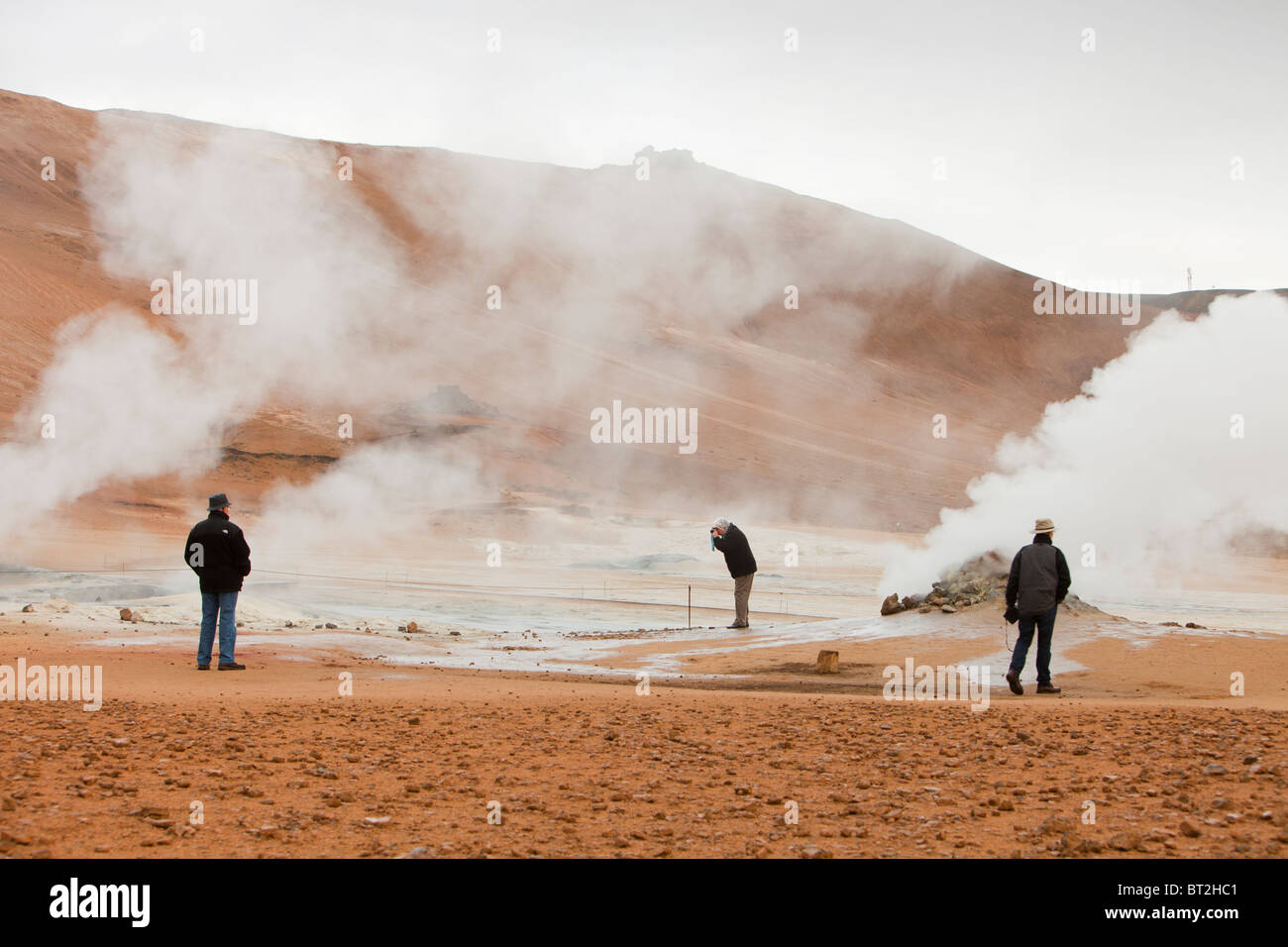 Fumaroles emitting steam in the geothermal area of Hverir near Myvatn ...