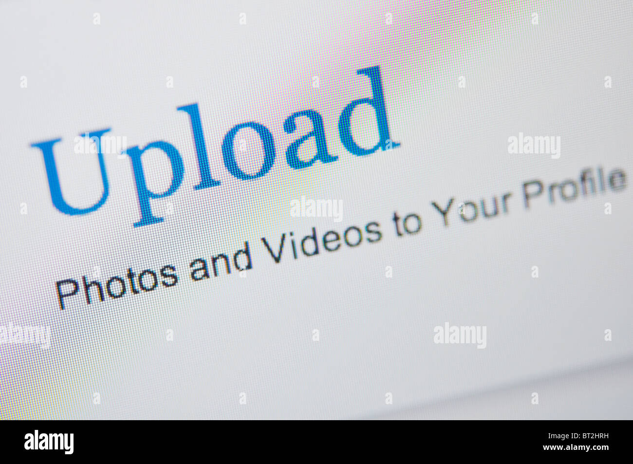 Upload button on website screen Stock Photo - Alamy