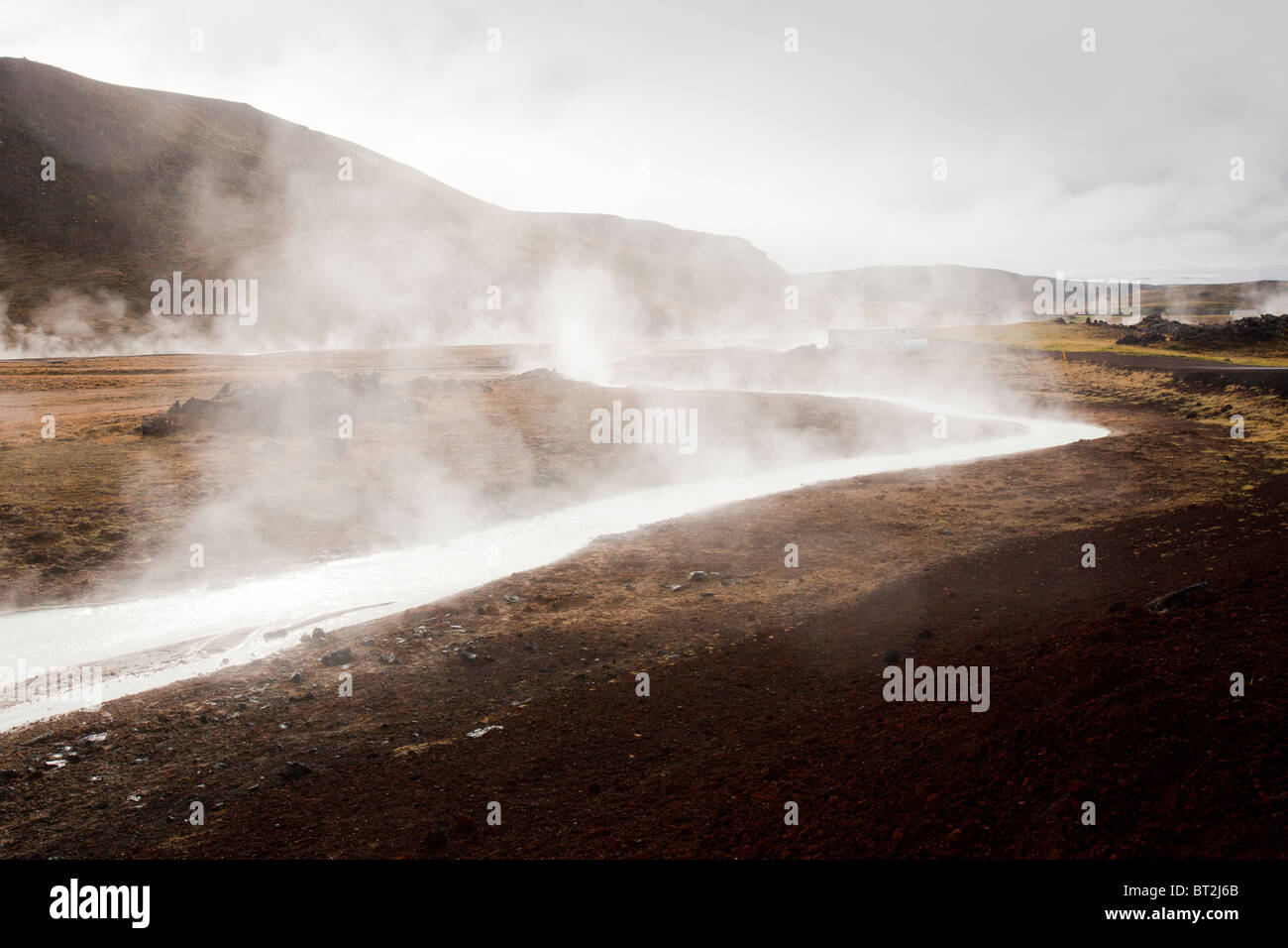 Hot water coming out of Krafla geothermal power station Stock Photo - Alamy