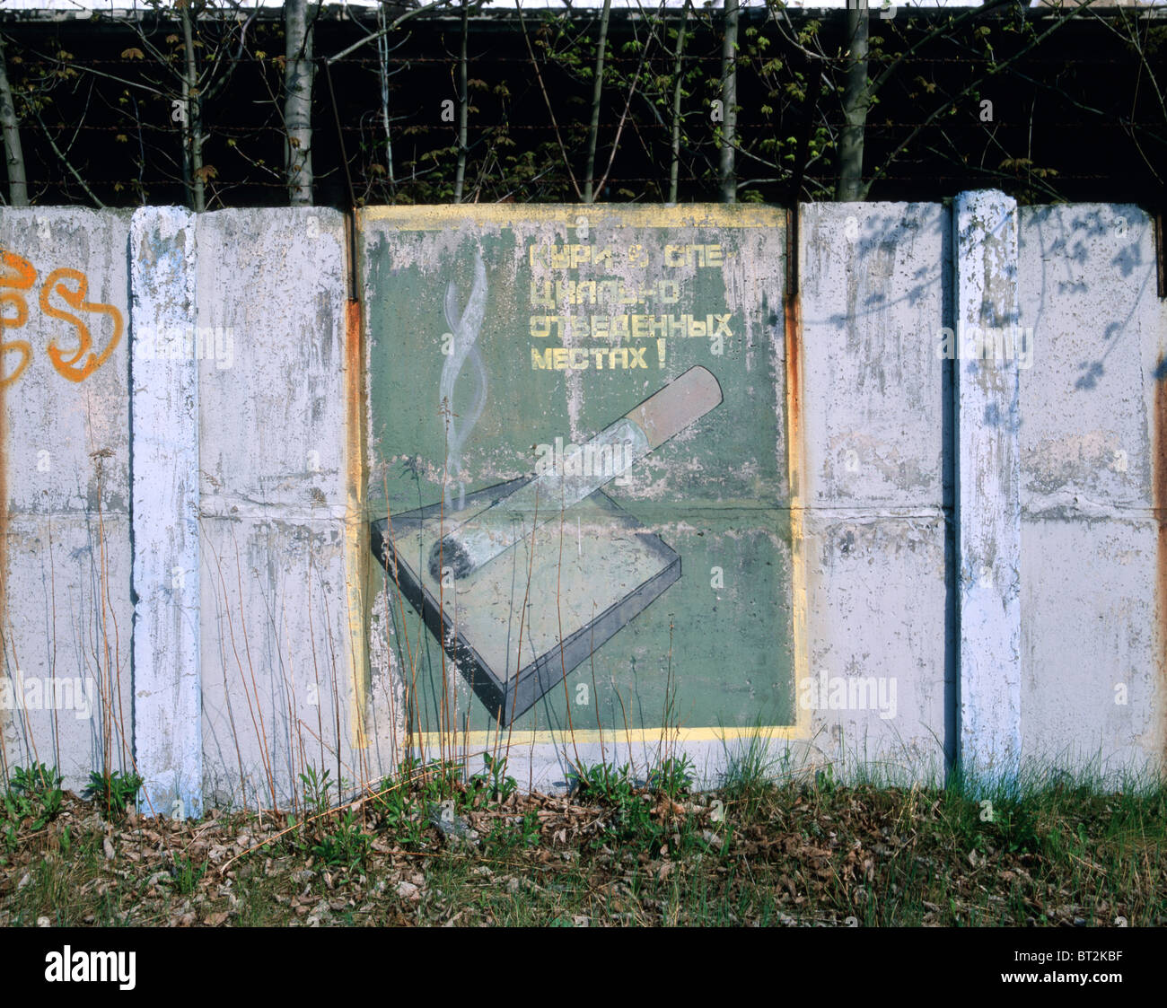 Graffiti on a concrete wall depicting safety regulation (fire hazard ...