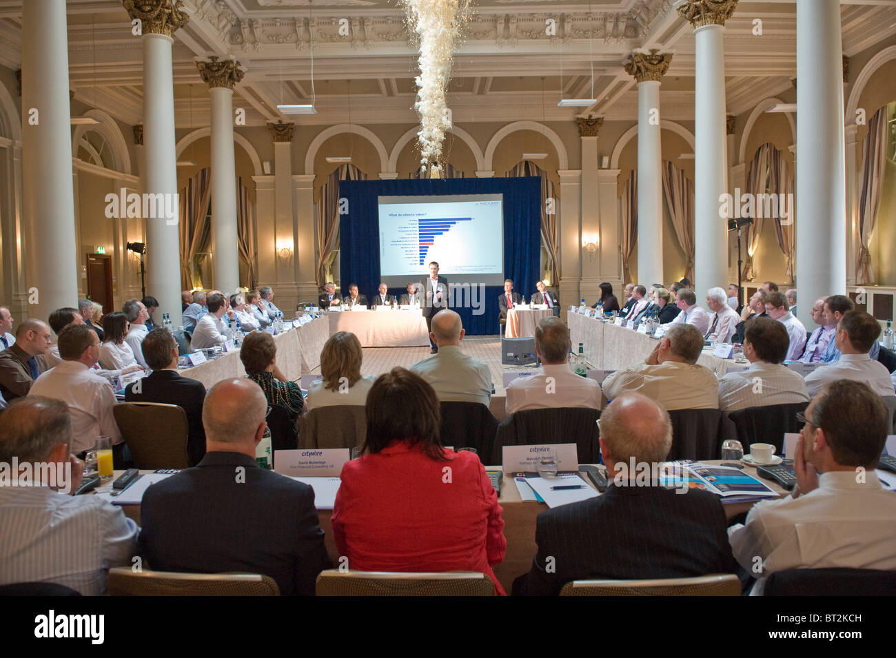Business people attending a conference Stock Photo - Alamy