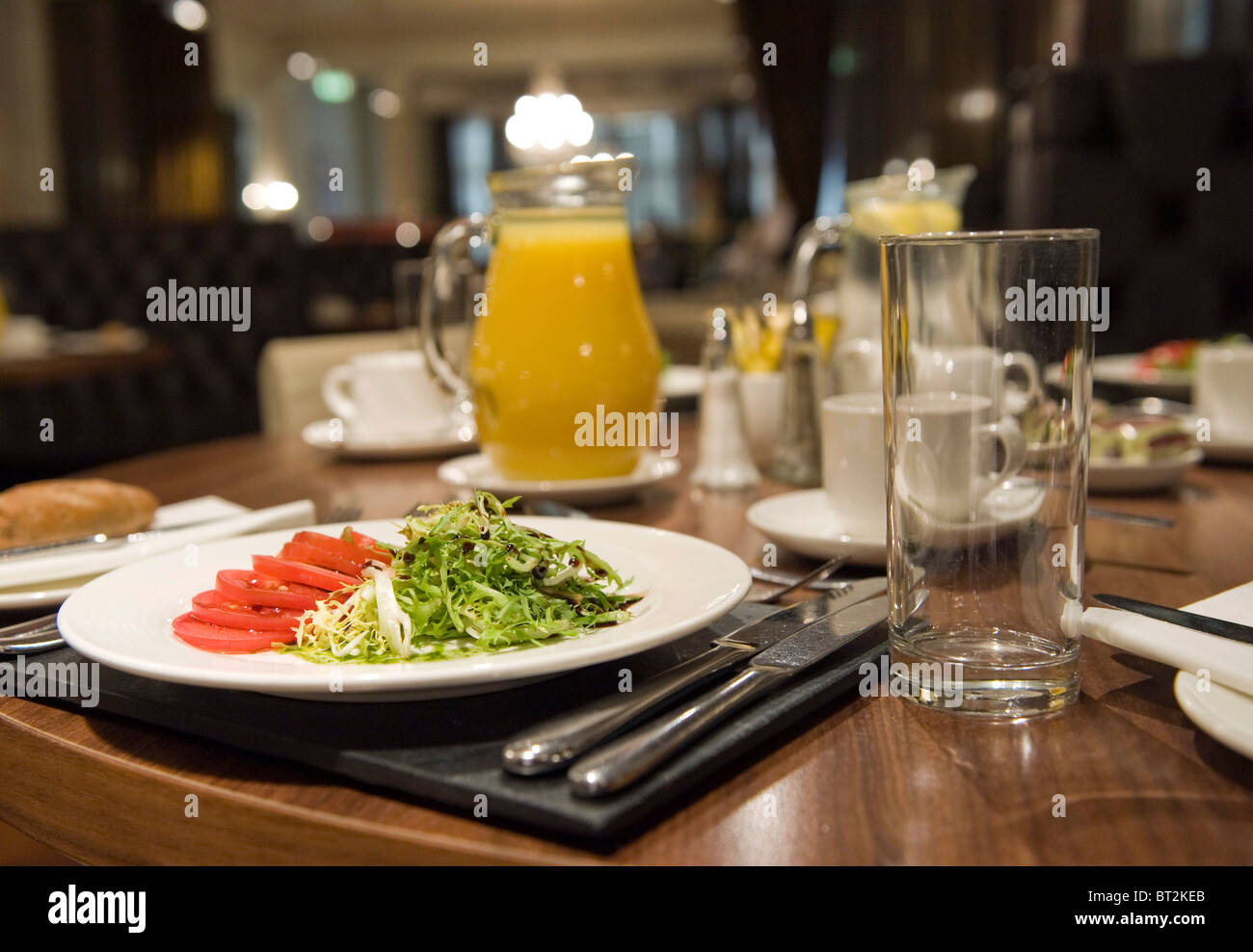Table set for business lunch Stock Photo - Alamy